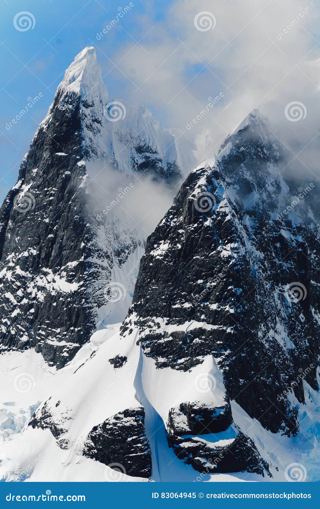 Black Snow Covered Mountain Picture. Image: 83064945