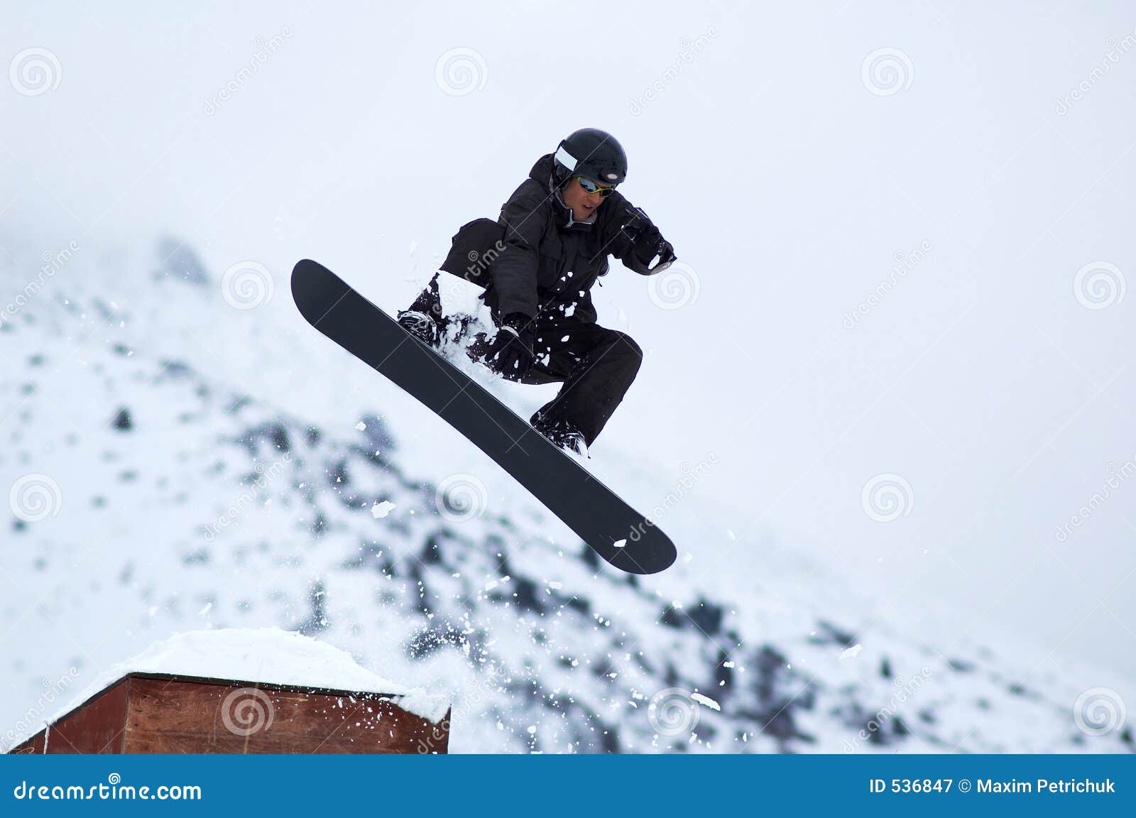 Black snowboarder fly stock image. Image of downhill, headband - 536847