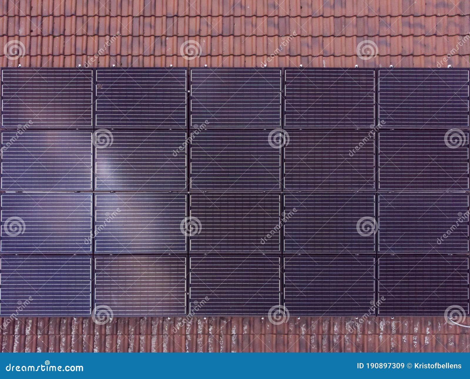 Black Solar Panels in Rectangular Form Installed on a Tiled Roof Stock ...