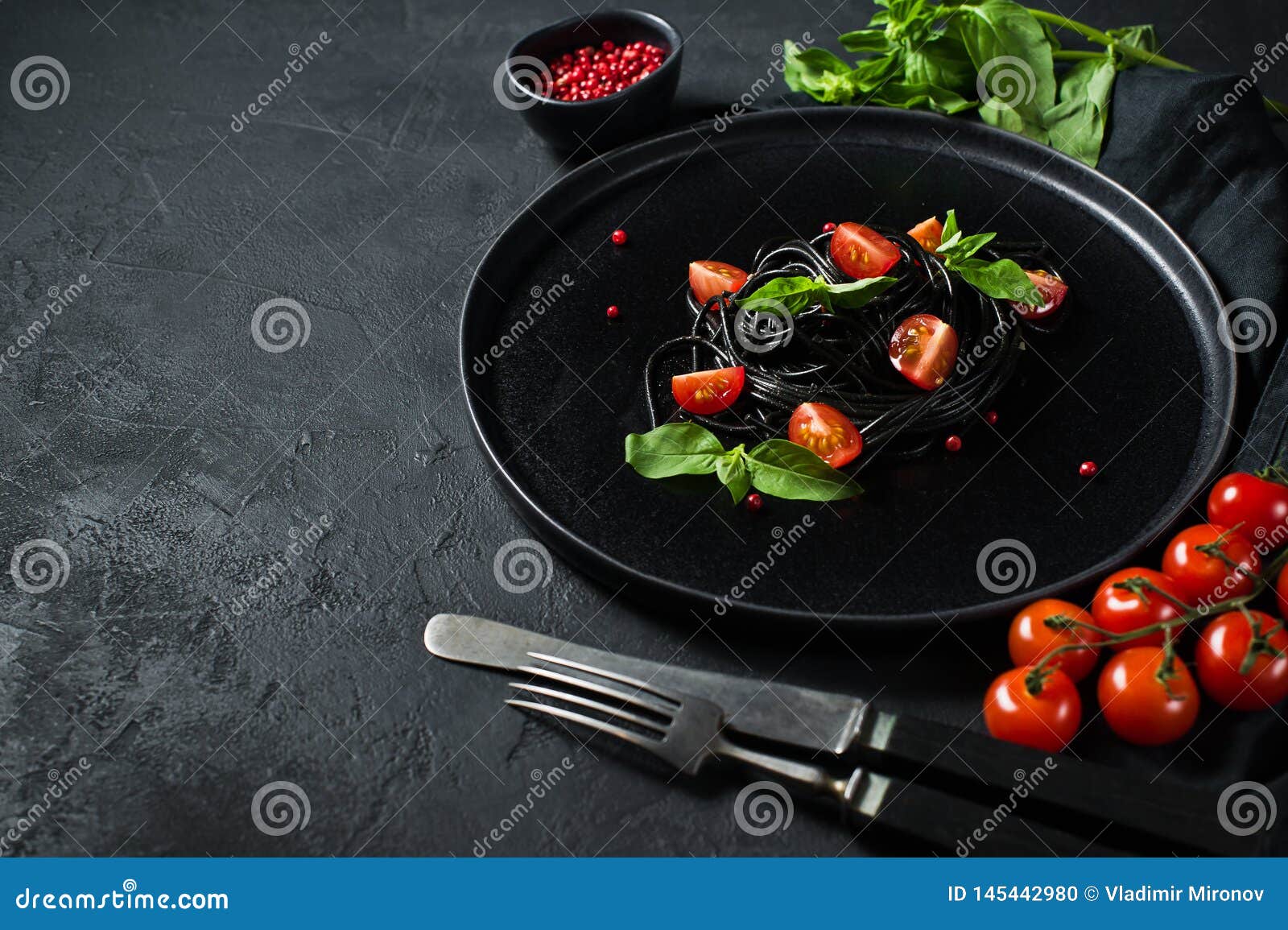 Black Spaghetti with Basil and Cherry Tomatoes, Vegetarian Pasta. Black ...