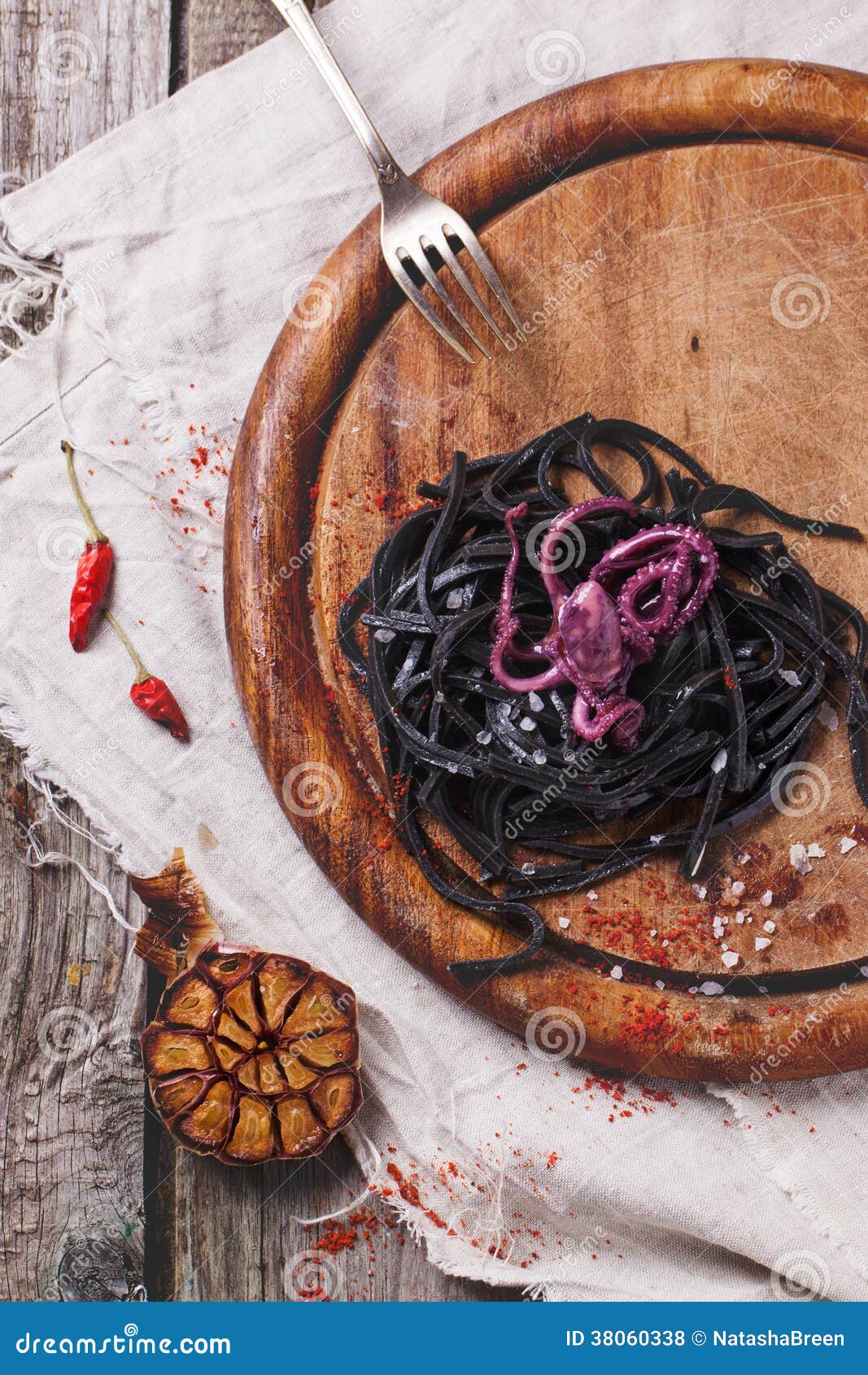 Black Spaghetti with Octopus Stock Photo - Image of board, refreshment ...