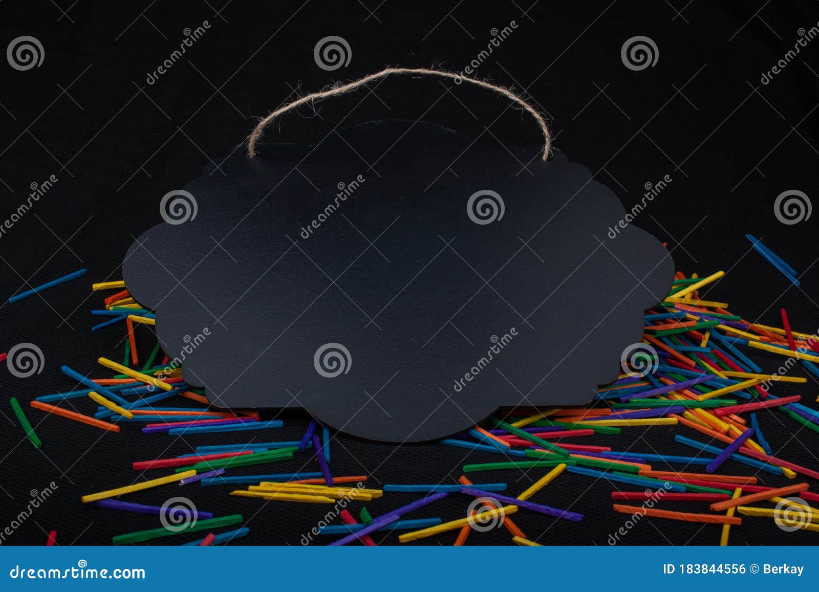 Black Speech Bubble Shaped Notice Board on Colorful Sticks Stock Photo ...