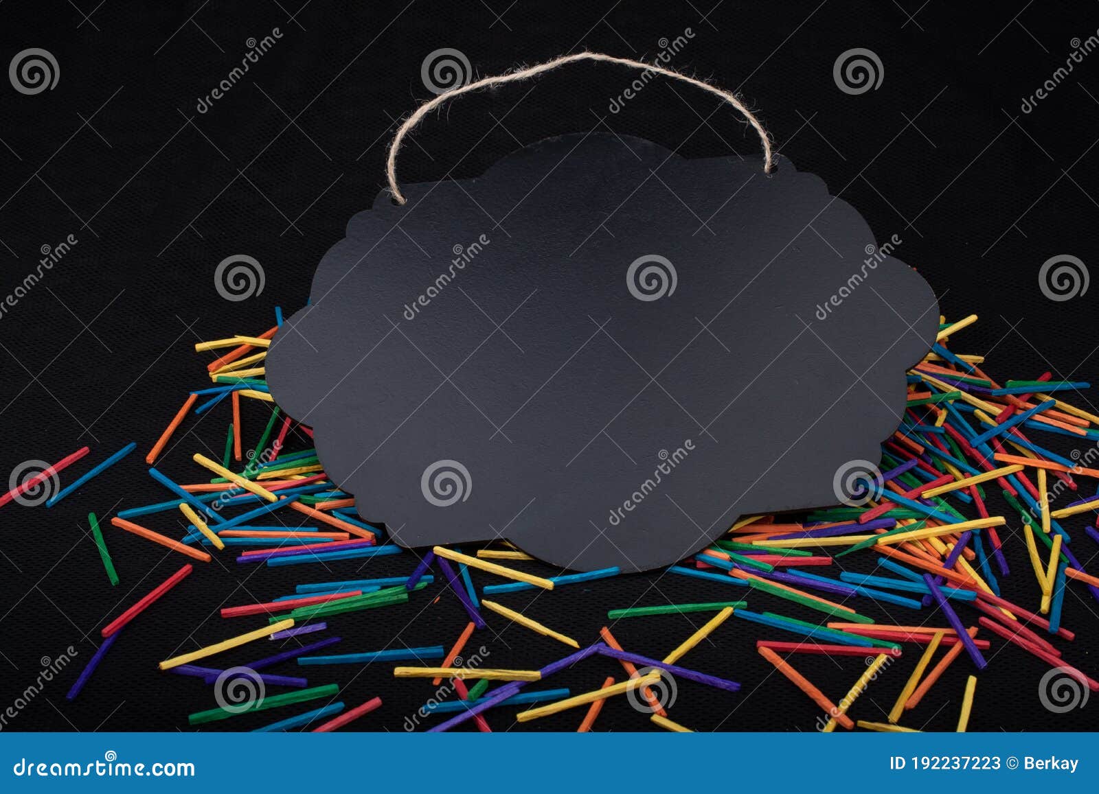 Black Speech Bubble Shaped Notice Board on Colorful Sticks Stock Image ...