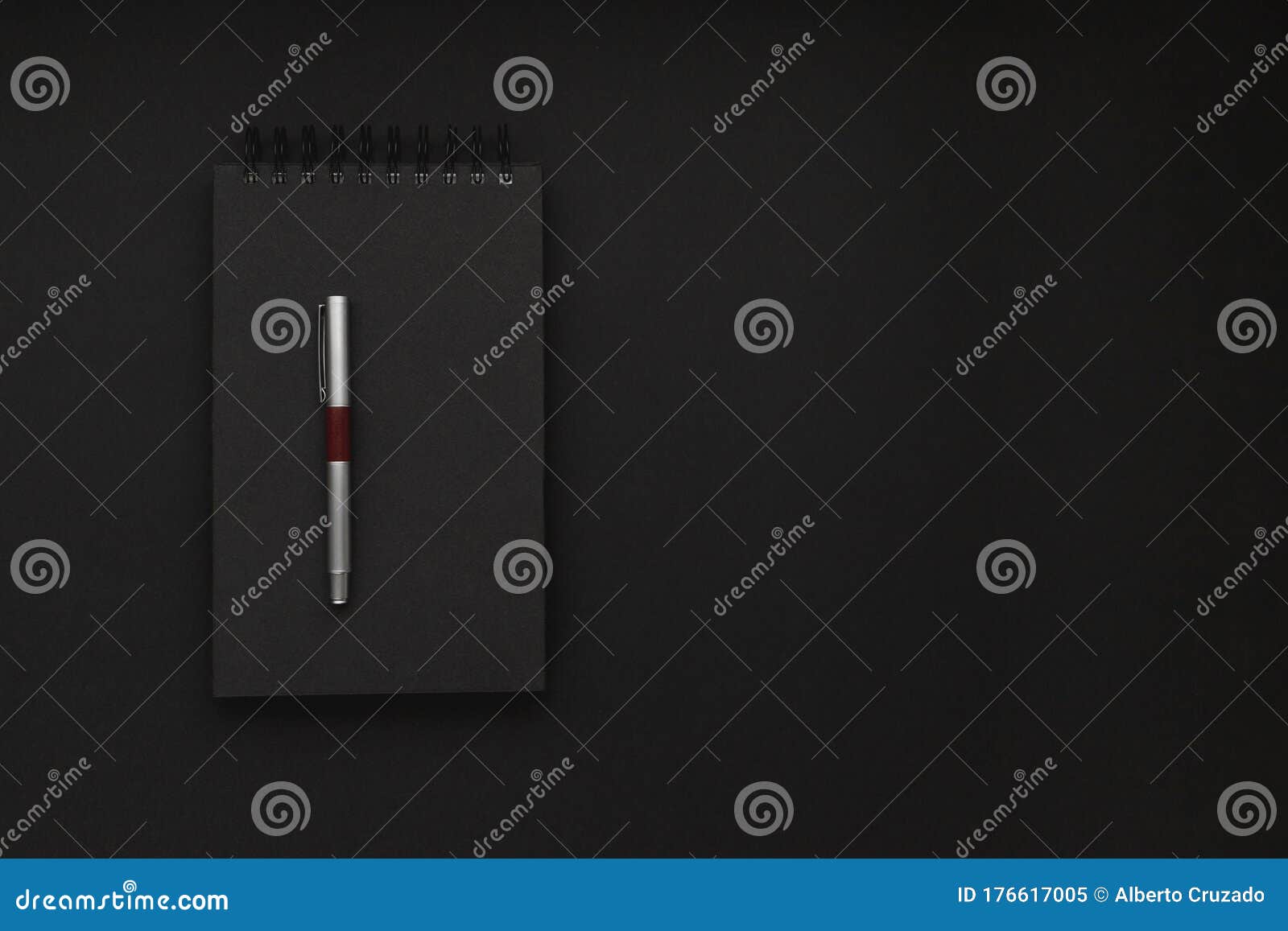 Black Spiral Notebook with a Silver Fancy Pen Stock Image - Image of ...