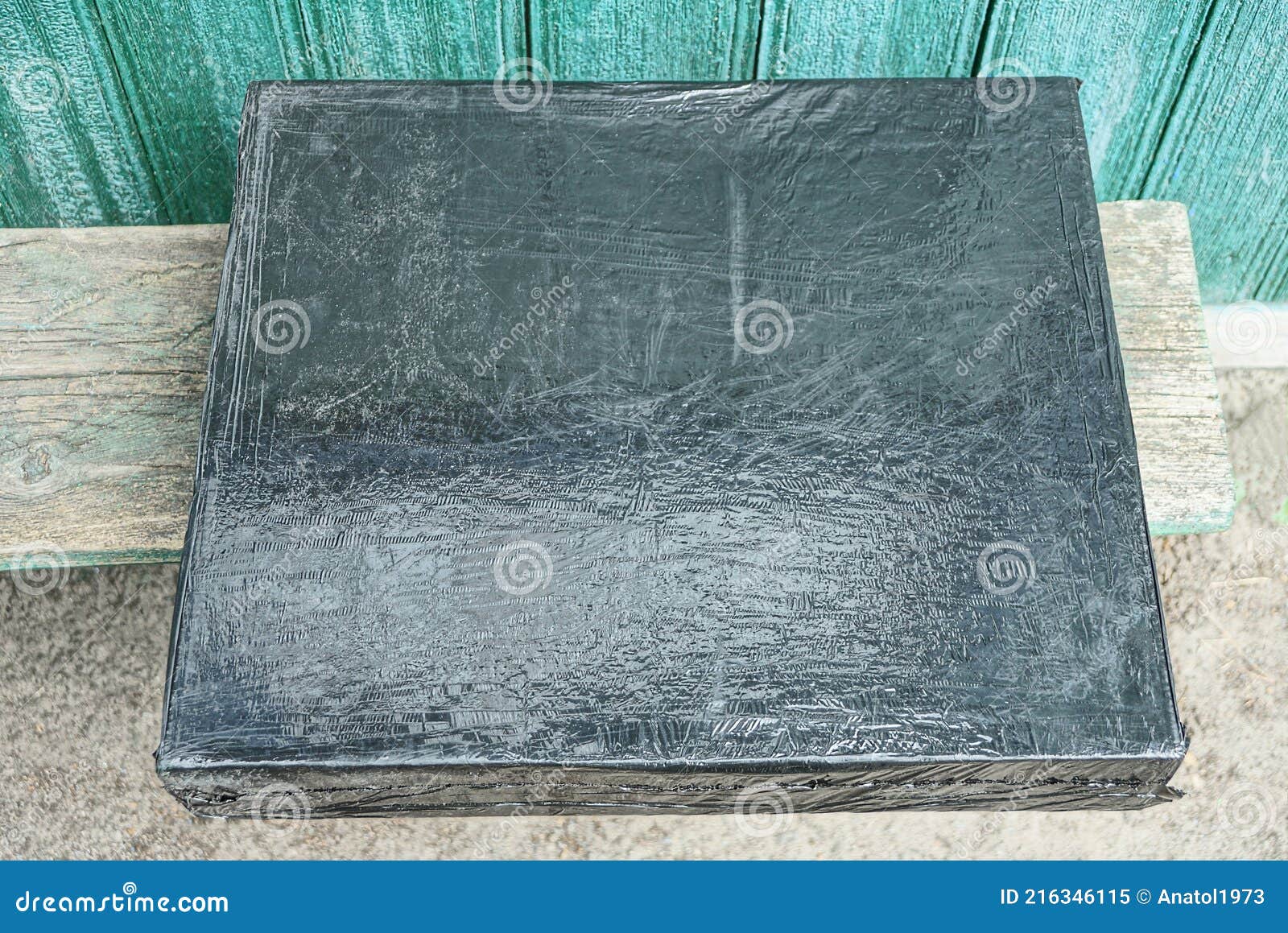 A Black Square Box in a Gray Cellophane Package Stock Image - Image of ...