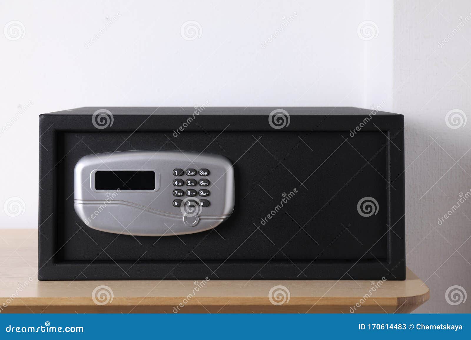 Black Steel Safe with Electronic Lock on Table Stock Image - Image of ...
