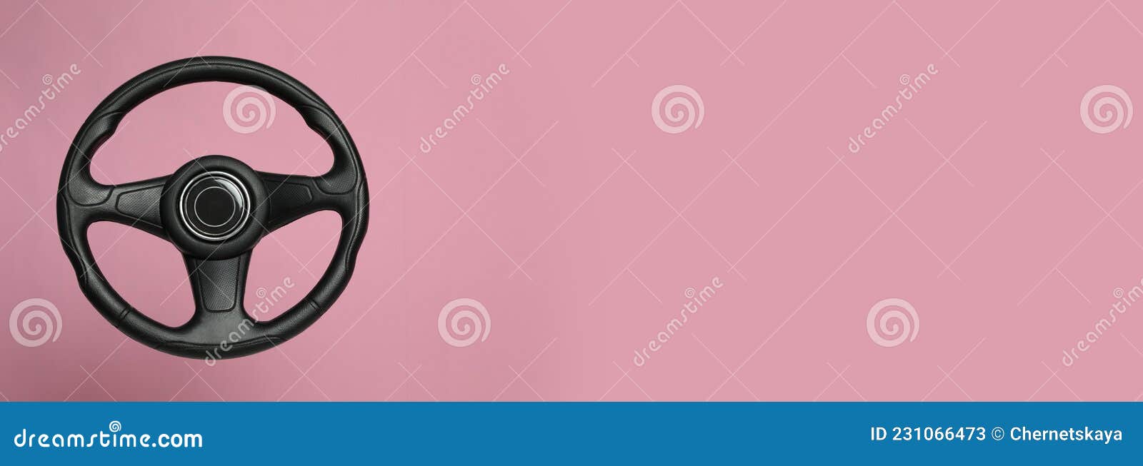 Black Steering Wheel on Pink Background, Top View with Space for Text ...