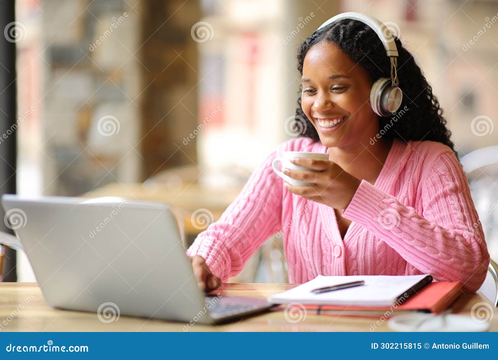 Black Student E-learning Drinking in a Bar Stock Image - Image of woman ...