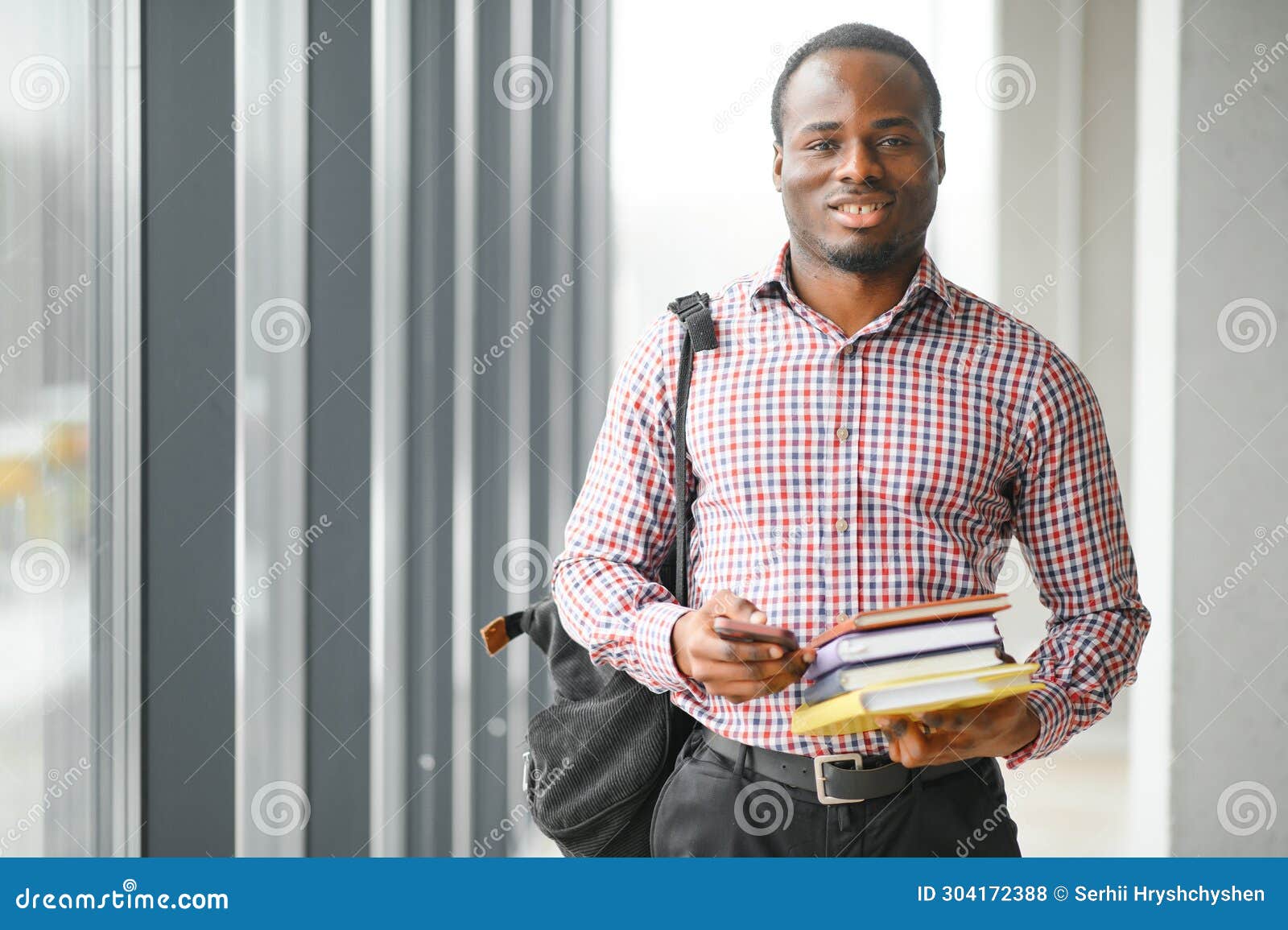 Black Student at University Classroom and Thinking of Something Stock ...