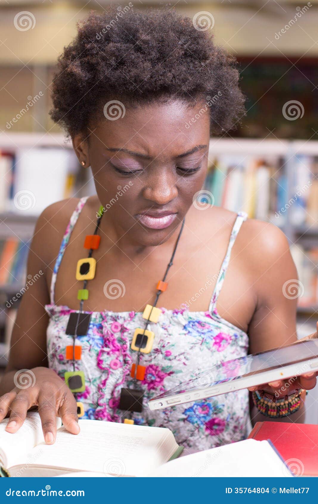 Black Student Using Her Tablet while Studying Stock Photo - Image of ...