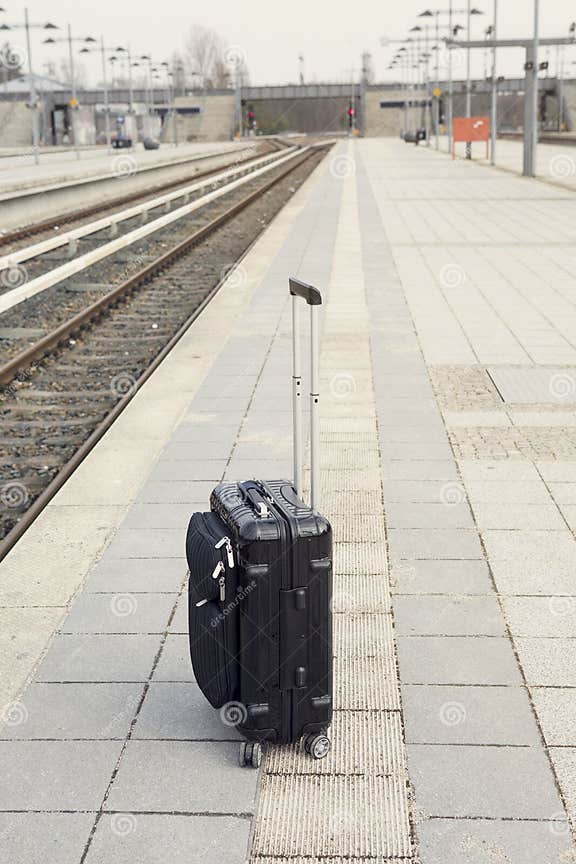Black Suitcase on Platform at a Trainstation Stock Photo - Image of ...