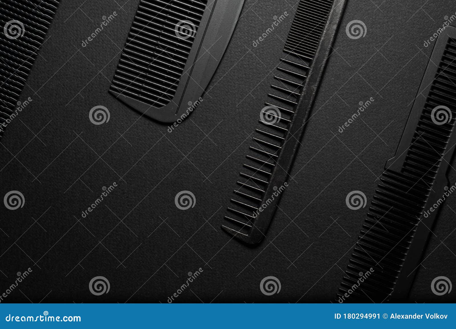 On a Black Surface are Old Barber Tools. Barber Tools. Four Comb. Black ...