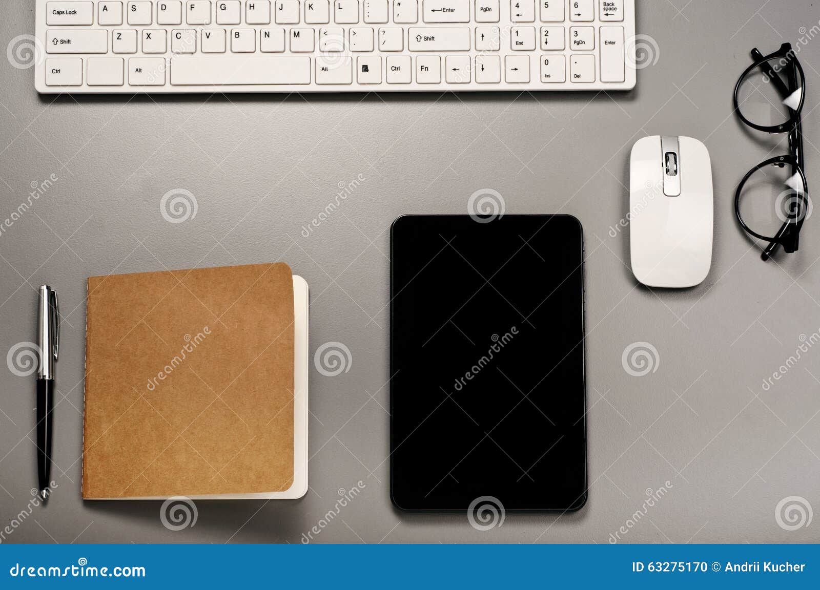 Black Tablet Computer with a Keyboard, Mouse, Pen and Notepad Stock ...