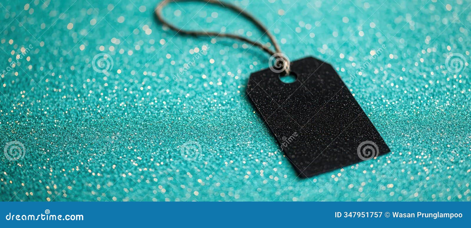 Black Tag on Shiny Turquoise Surface for Labeling and Design Use Stock ...