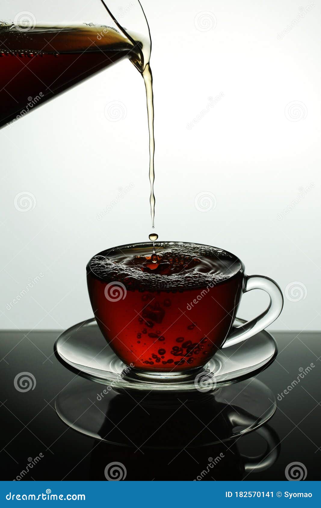 Black tea in a glass cup stock image. Image of closeup - 182570141