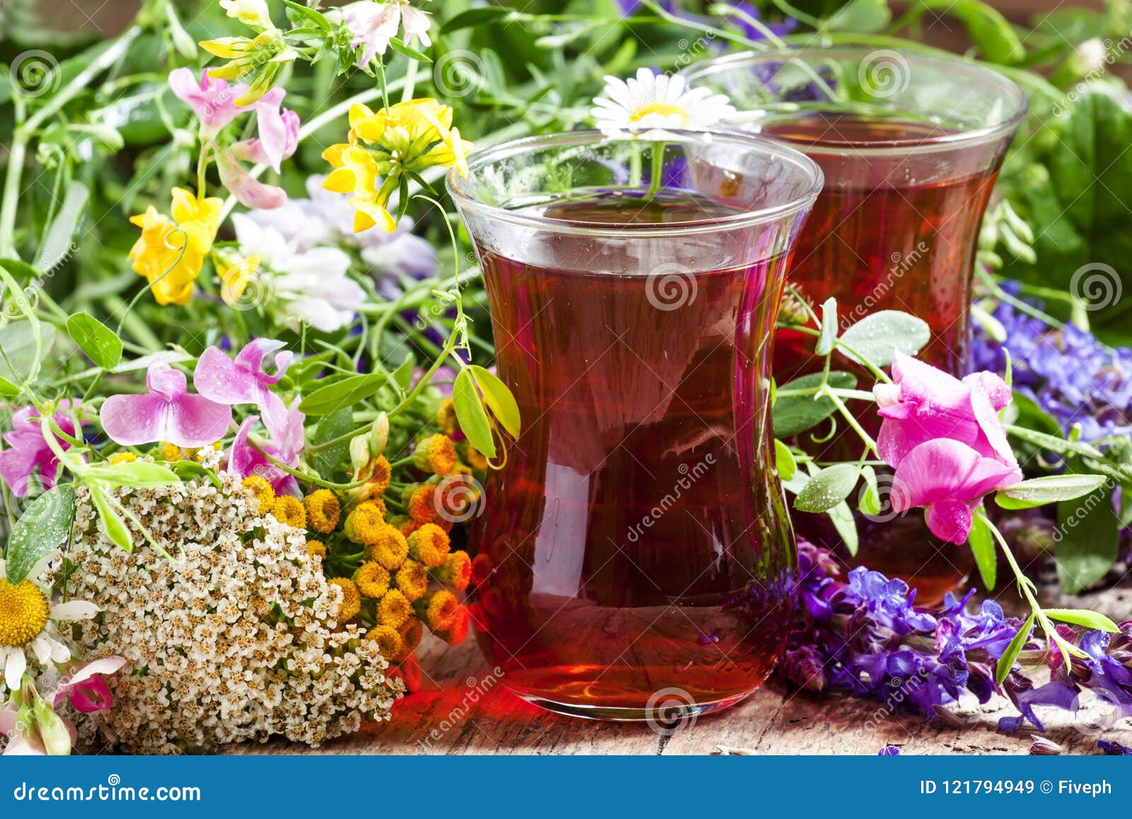 Black Tea with Herbs in an Authentic Middle Eastern Glasses on Stock ...