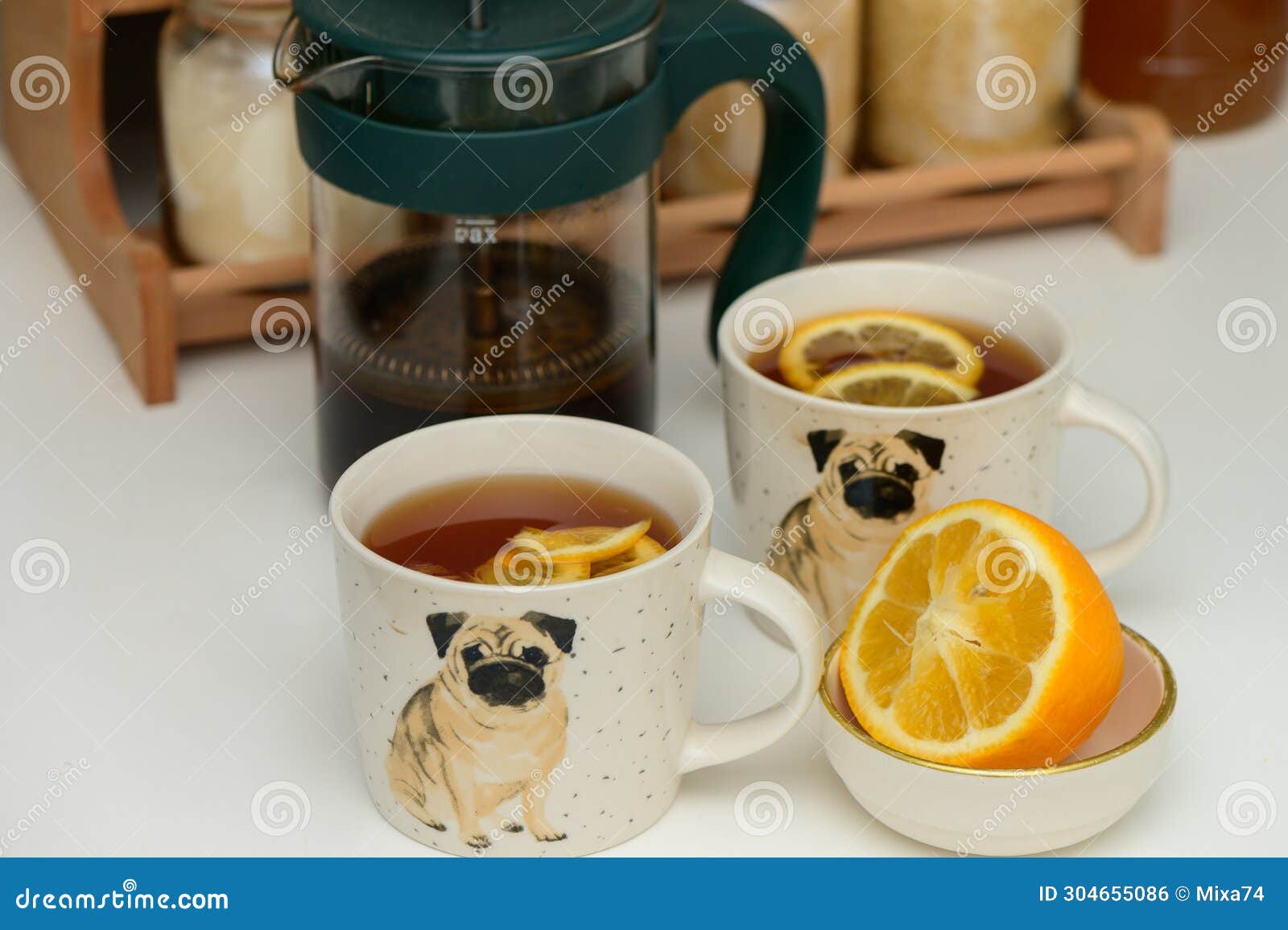 Black Tea with Lemon in Cups with a Drawn Pug 3 Stock Photo - Image of ...