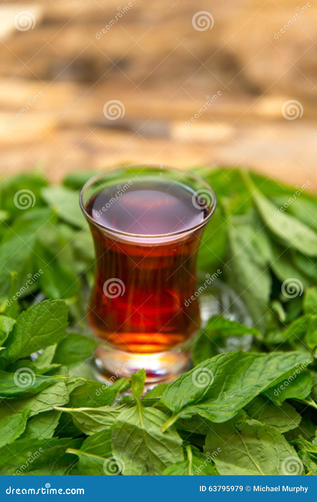 Black tea on mint leafs stock image. Image of healty - 63795979