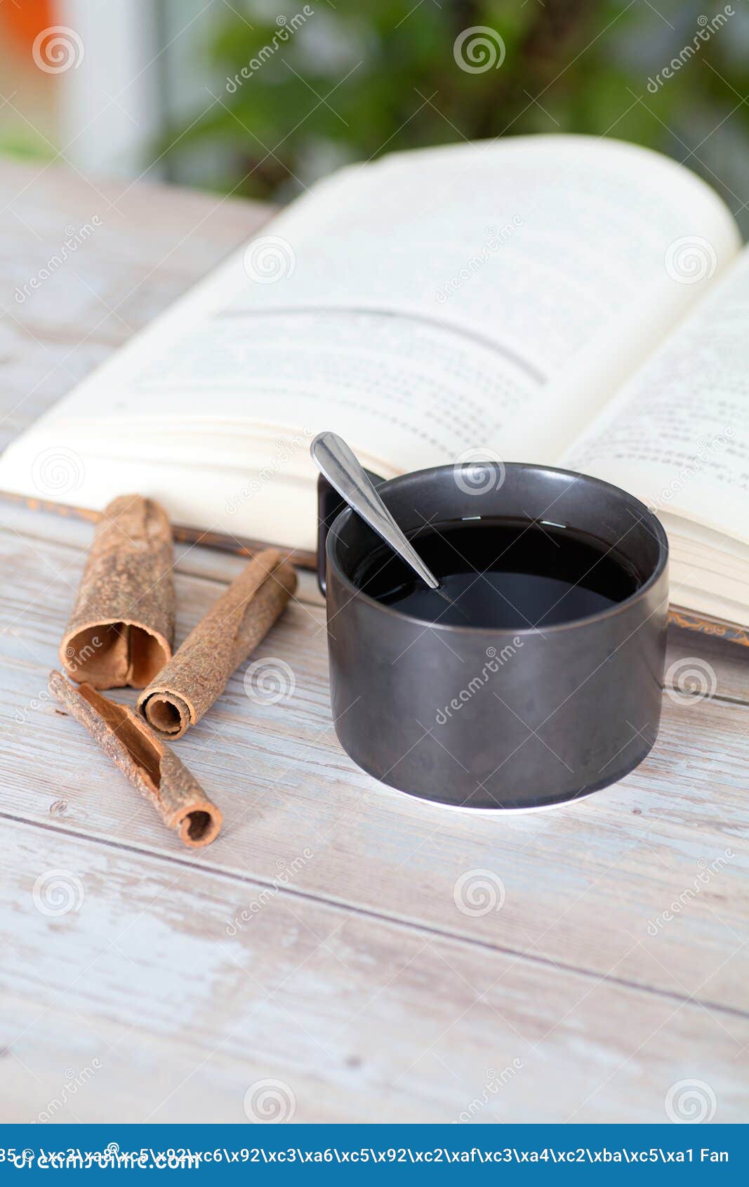 Black tea and opened book stock image. Image of composition - 228938785