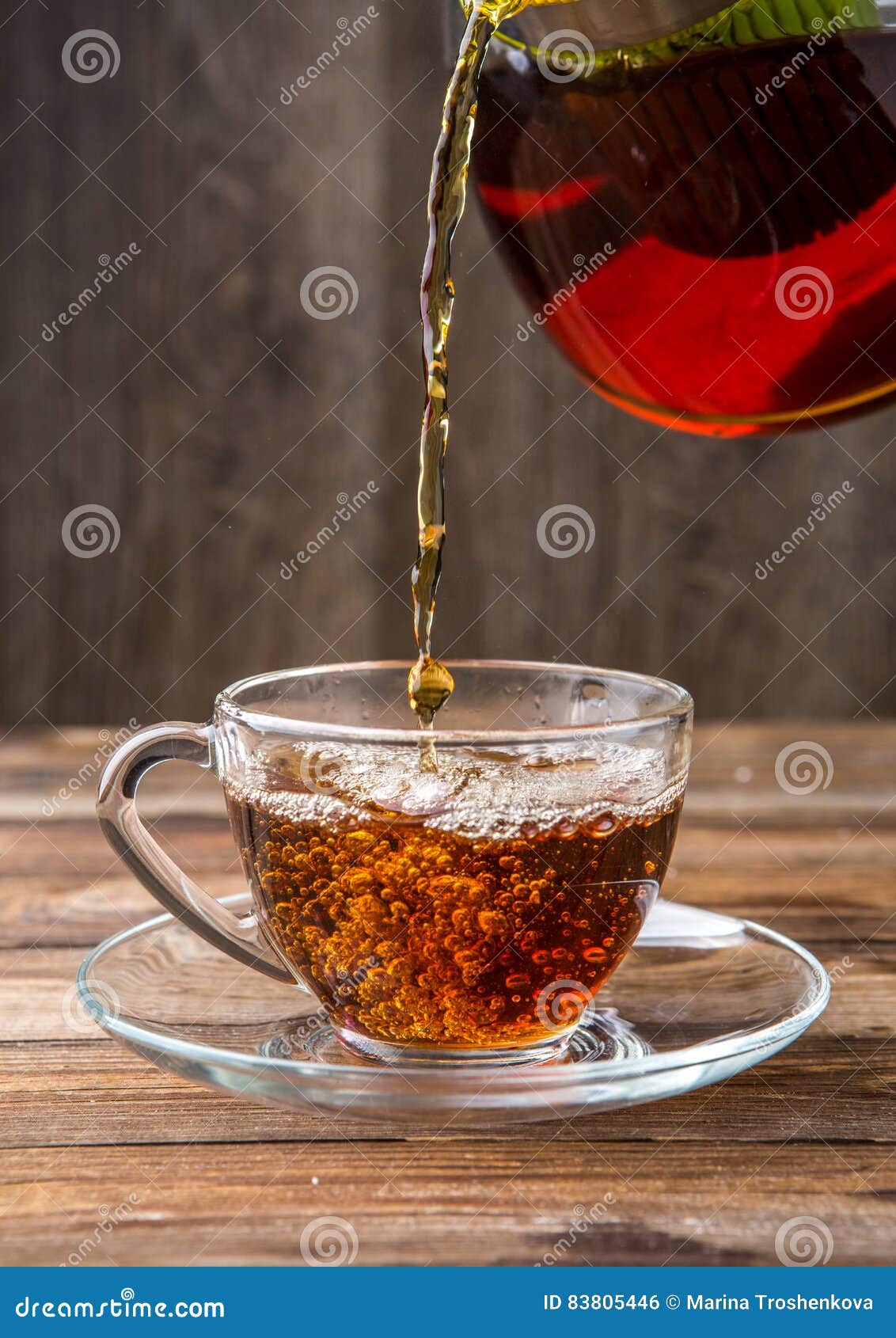 Black Tea Poured from Teapot Stock Photo - Image of desk, natural: 83805446