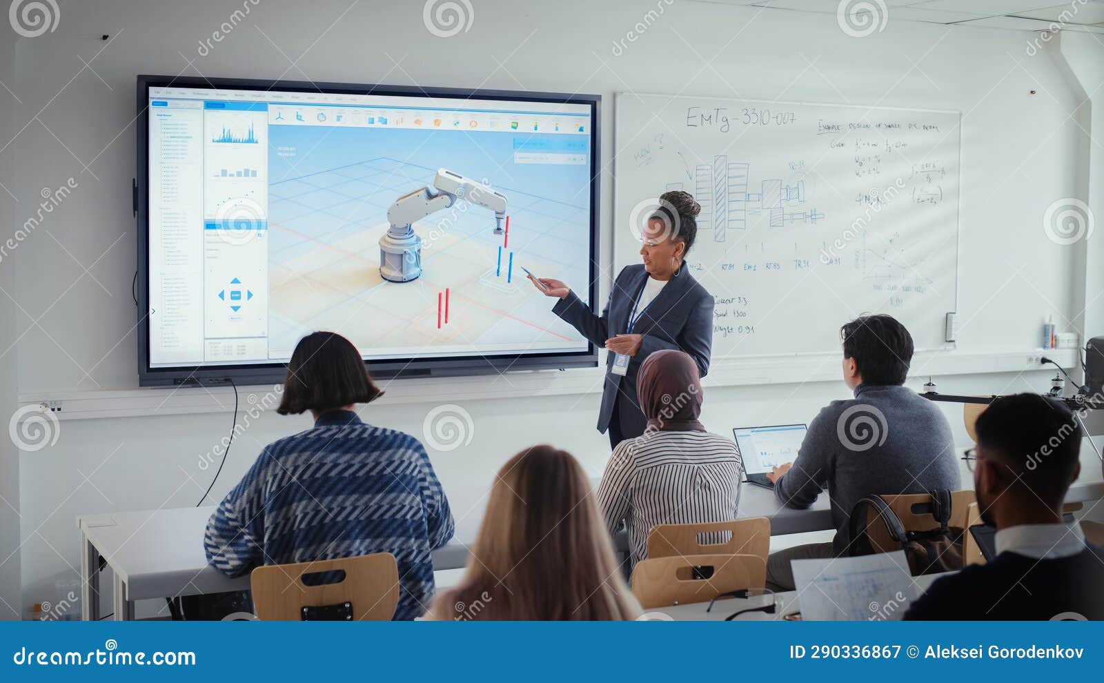 Black Teacher Explain Engineering To Students and Point at Interactive ...