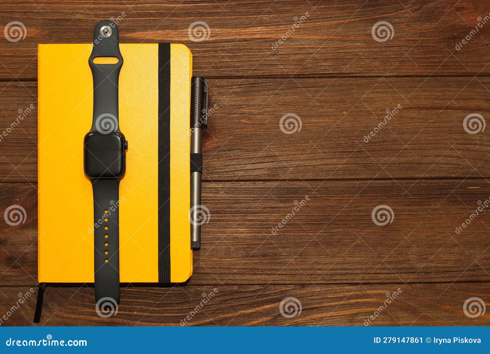 A Black Technological Smart Watch Lies on a Notepad for Time Management ...