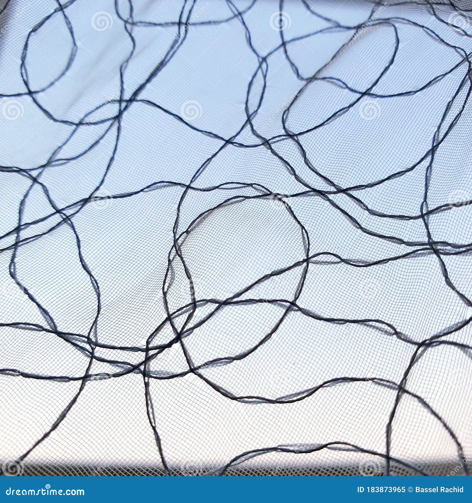 Black Thread Intertwined on a White Background Stock Image - Image of ...