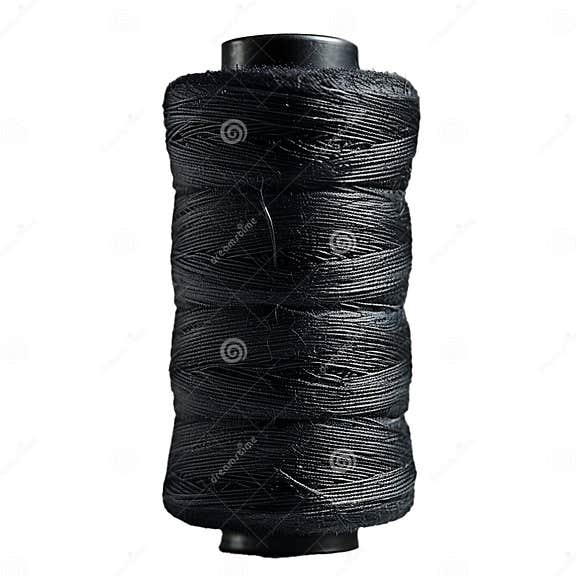 Black Thread Spool on a Soft Surface Highlighting Texture and Detail in ...