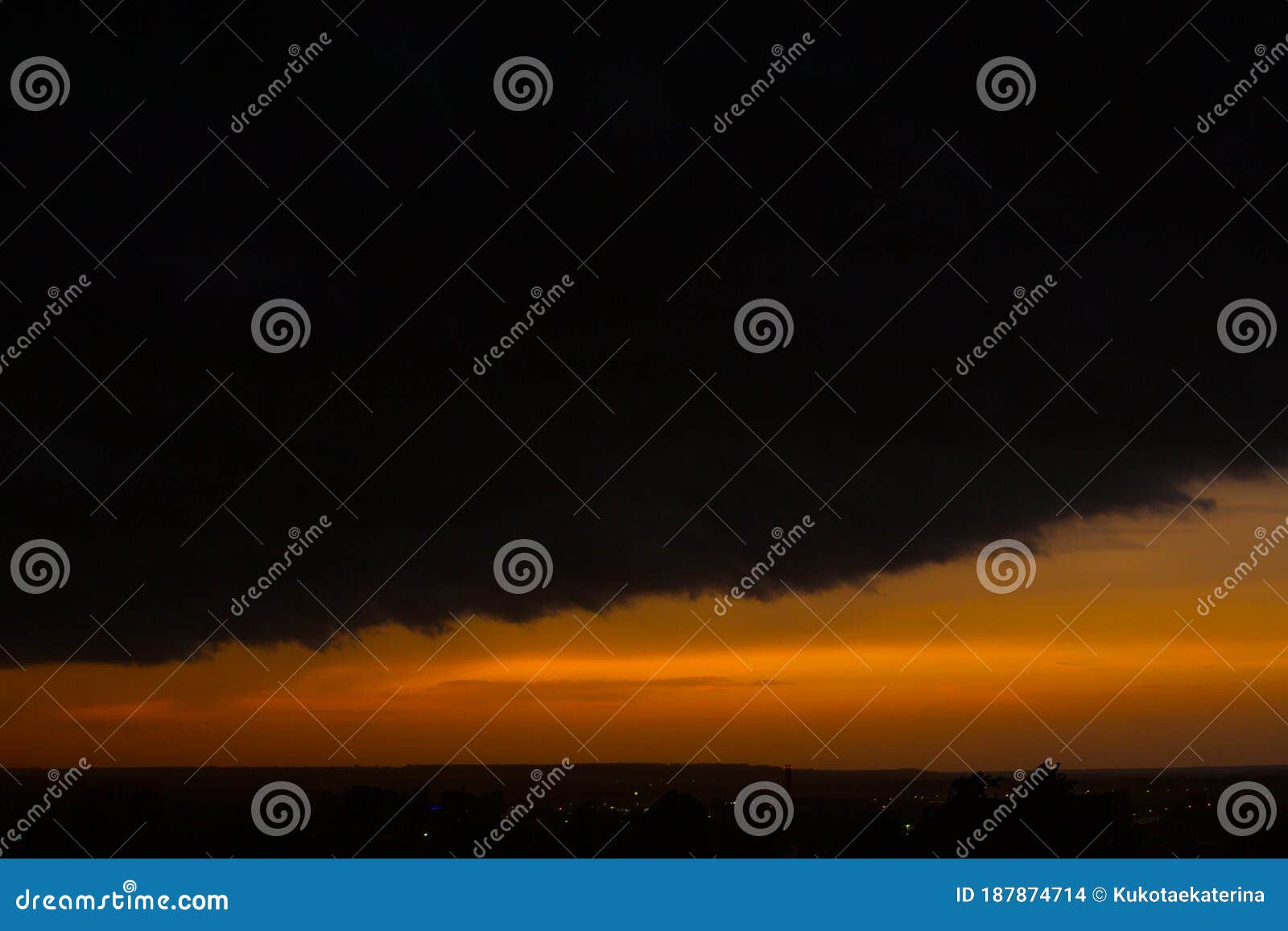 Black Thunderclouds at Sunset. Bright Orange Sunset and Dark Clouds ...