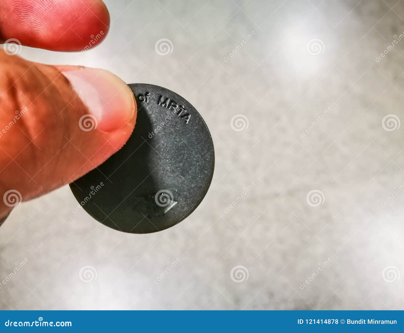 A Black Token Chip Is Electronic Ticket System For The Metropolitan ...