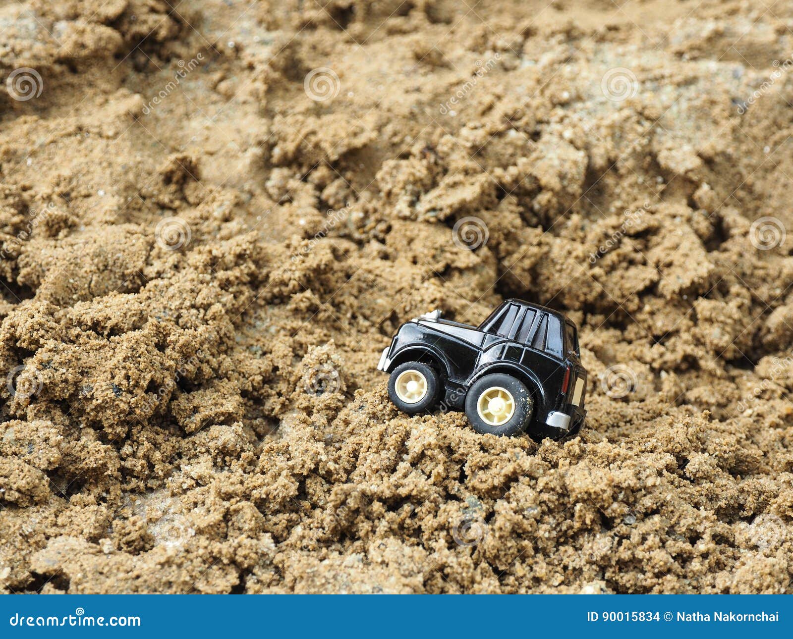A Black Toy Car Park in Sandbox. Stock Photo - Image of sandbox, park ...