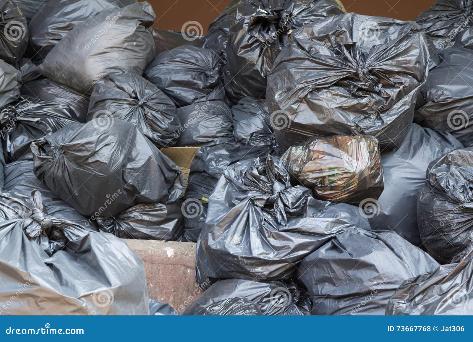 Black trash bags pile stock photo. Image of rubbish, environmental ...