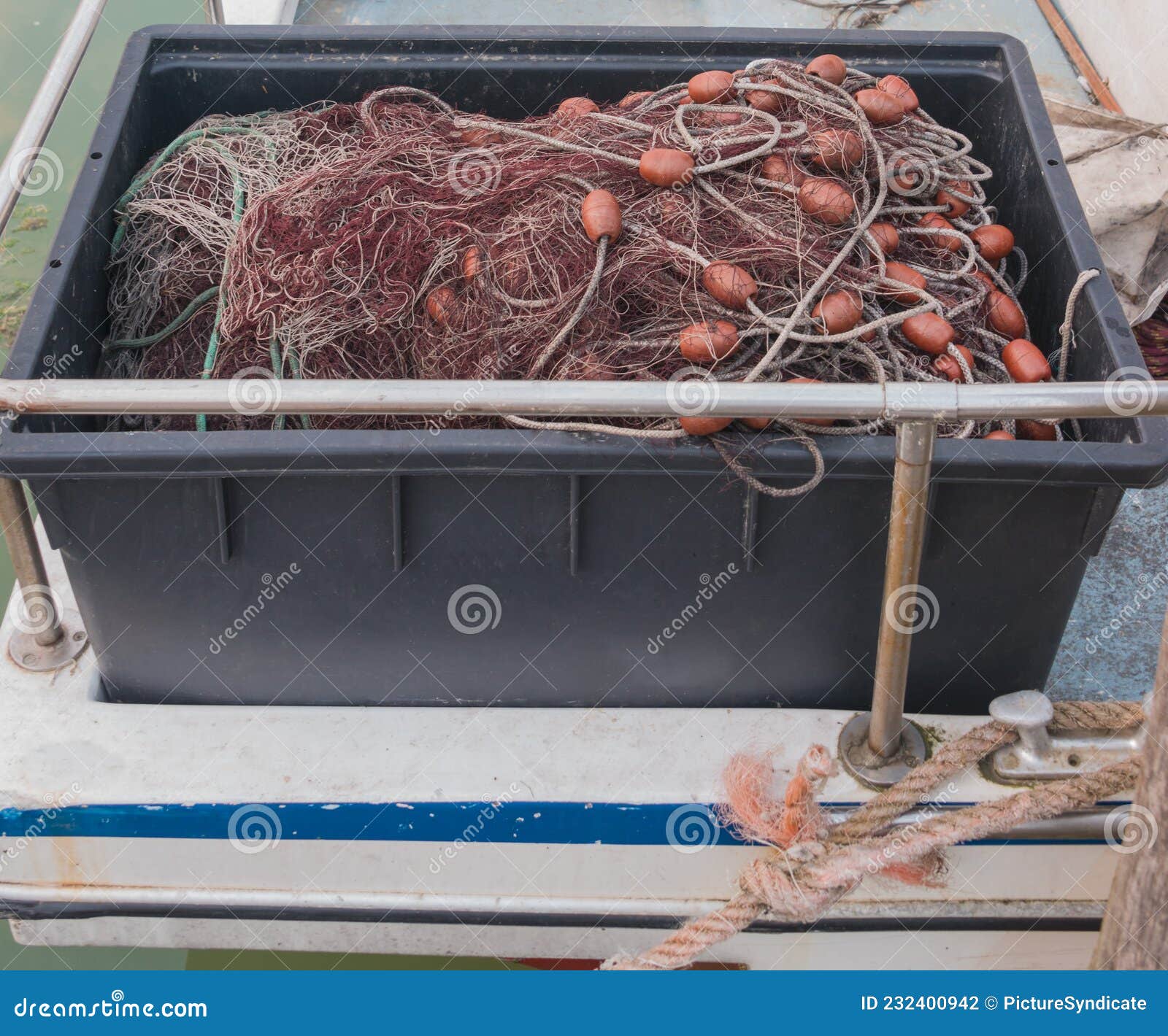 Black Tub with Fishing Net on Boat Stock Photo - Image of gear, rope ...