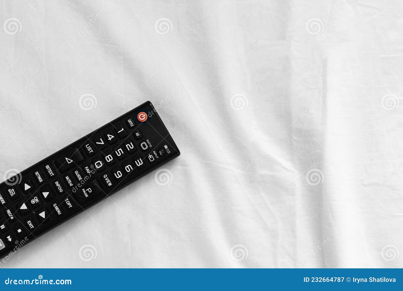 Black TV Remote on a Bed in a Hotel. Stock Image - Image of movie ...