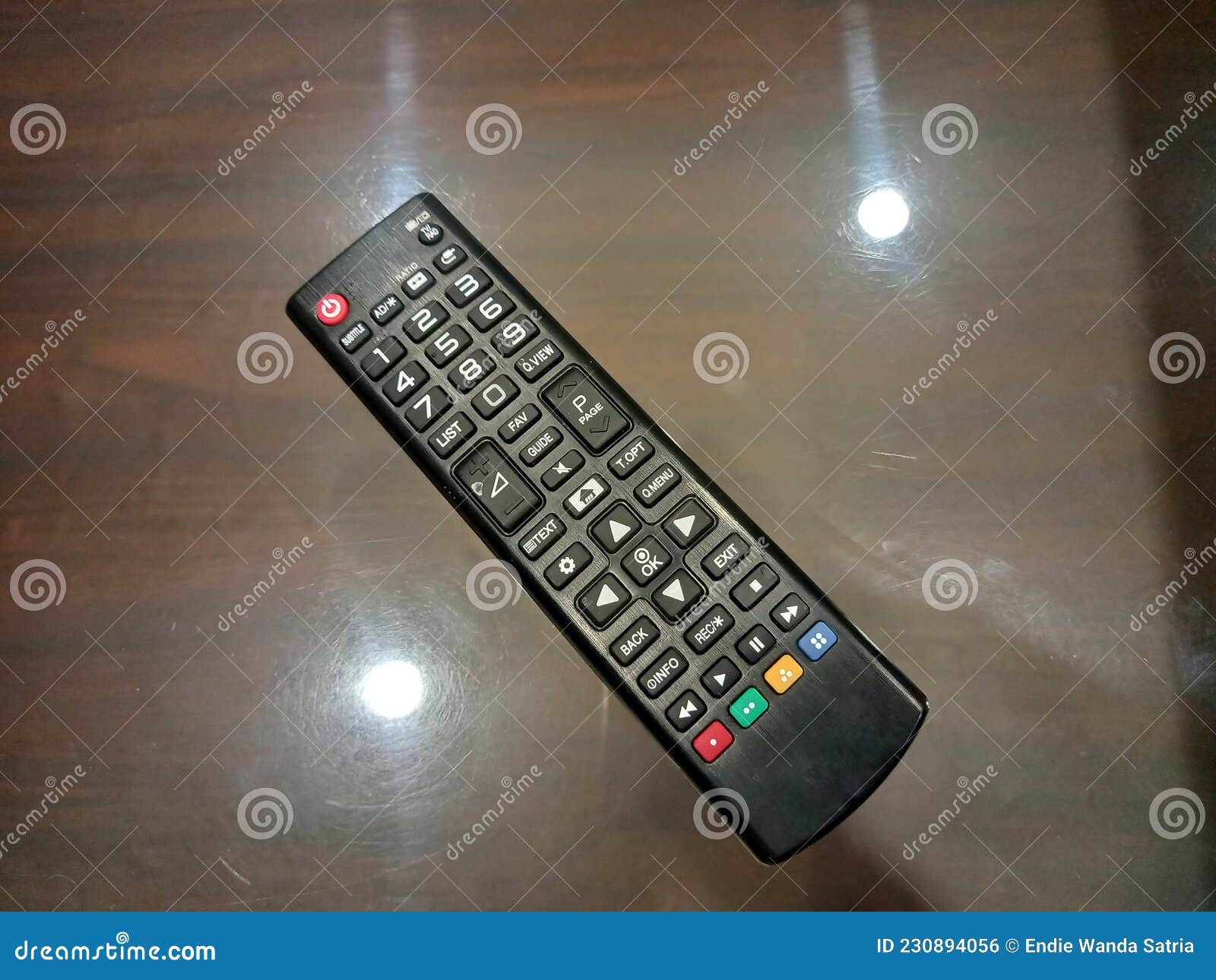 Black Tv Remote on the Table Stock Photo - Image of blue, yellow: 230894056