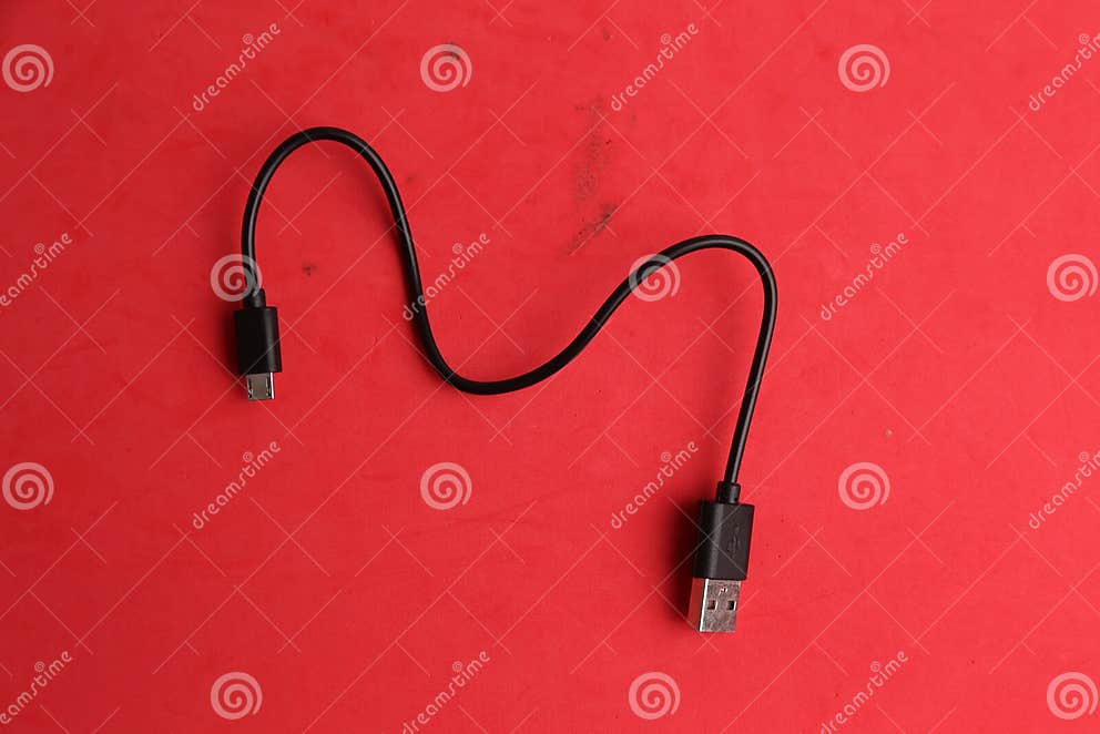 Black USB Cable on a Red Surface Stock Image - Image of technology ...