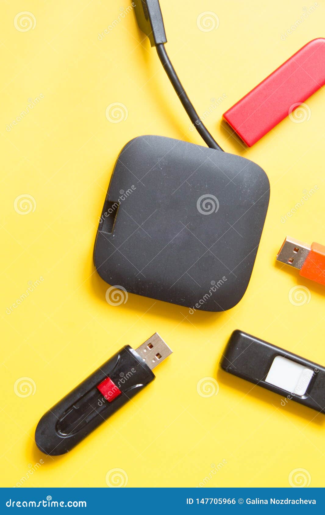 Black USB HUB with Usb Stick Flash Drives on Yellow Background. Top ...