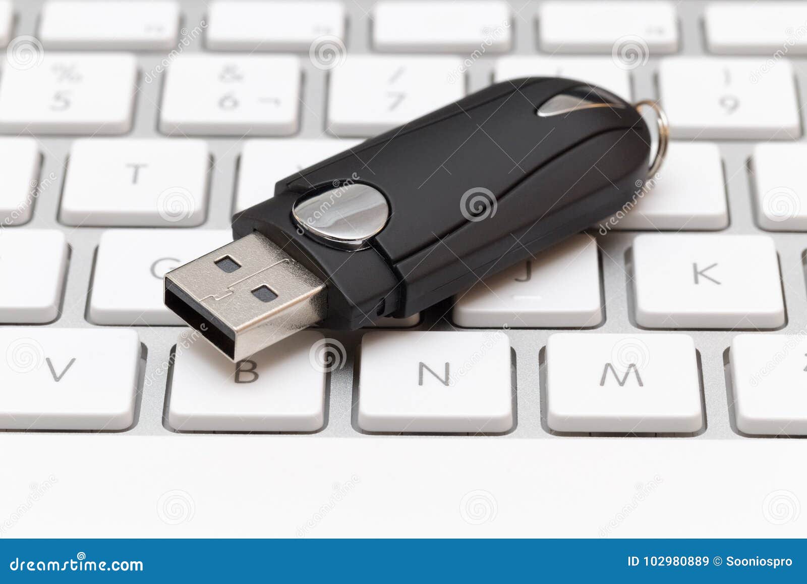 Black USB Memory Stick on White Keyboard Stock Image - Image of digital ...