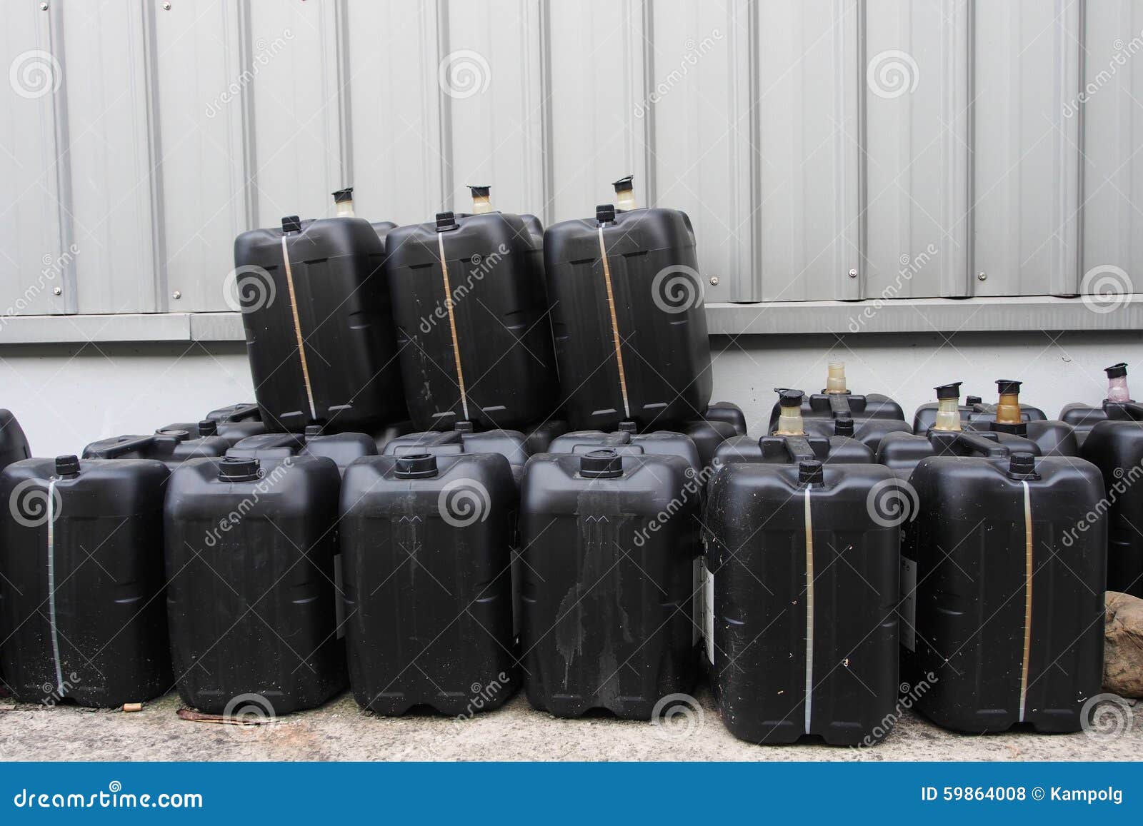 Black Used Oil Gallons Pile Stock Photo - Image of industry, used: 59864008