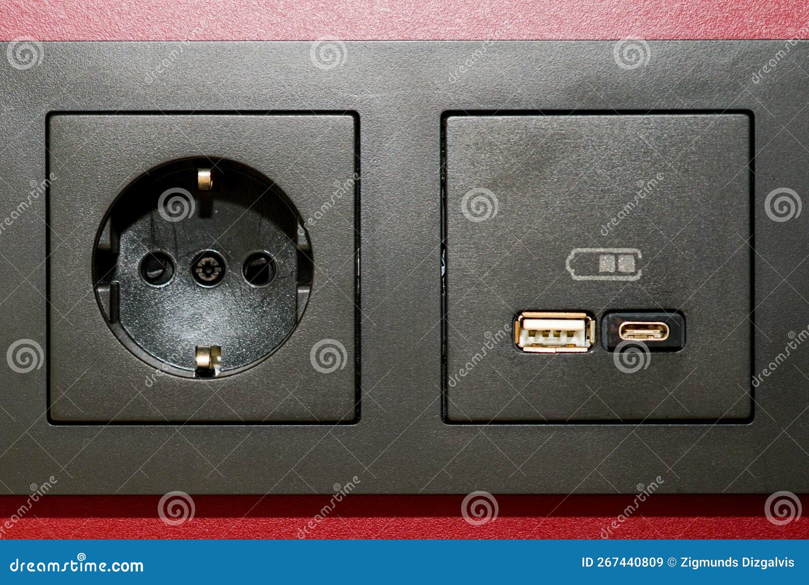 A Black 220V, USB and USB C Type Socket Block is Built into the Wall ...