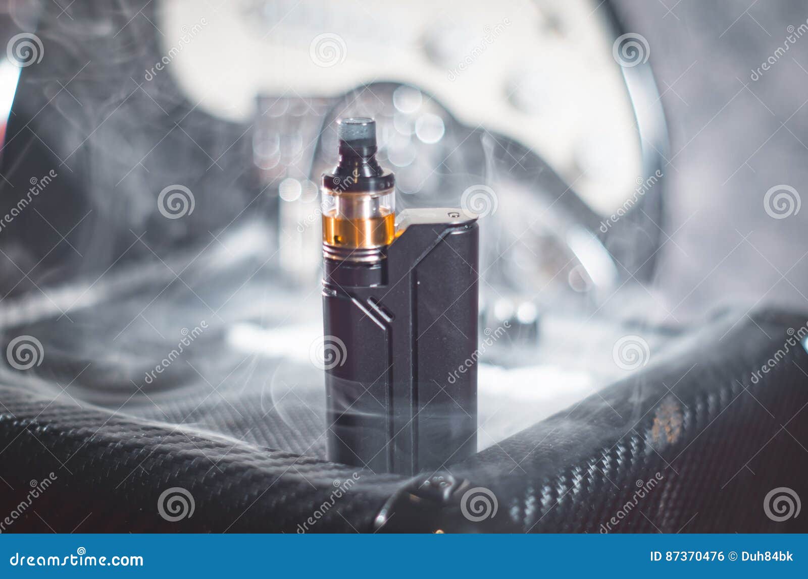 Black Vaporizer in the Smoke Stock Photo - Image of quit, device: 87370476