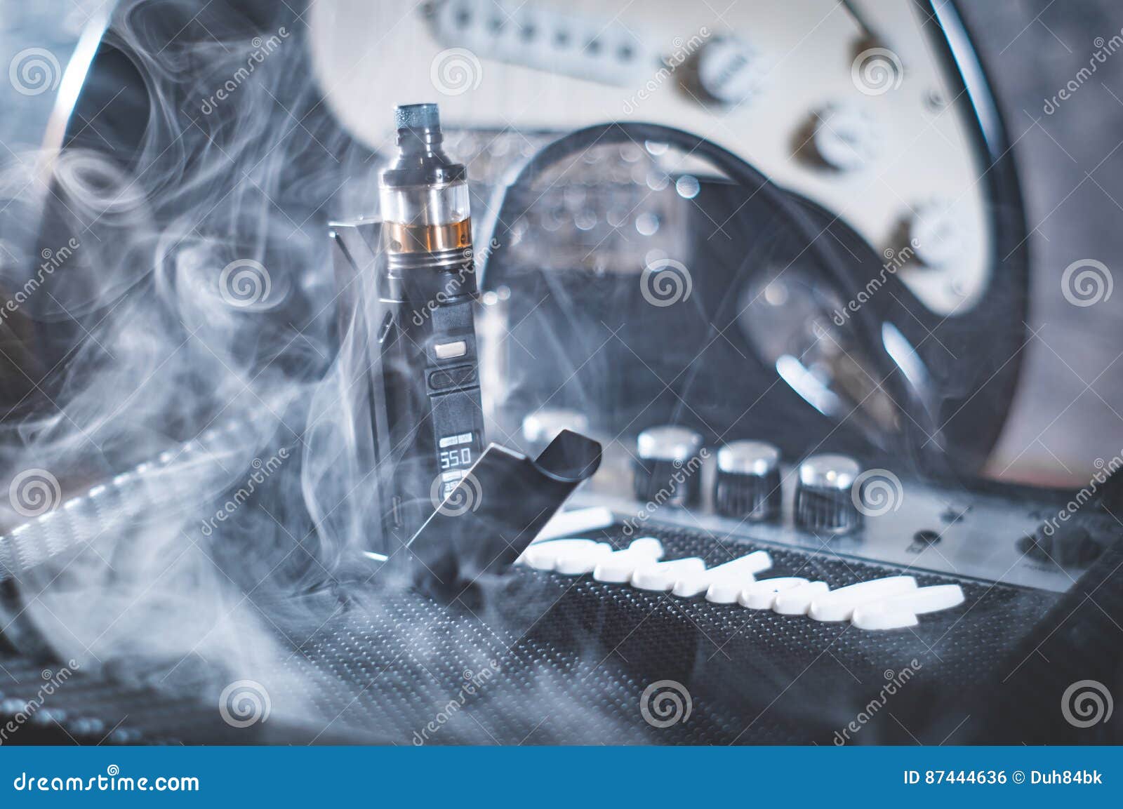 Black Vaporizer in the Smoke Stock Photo - Image of steam, liquid: 87444636