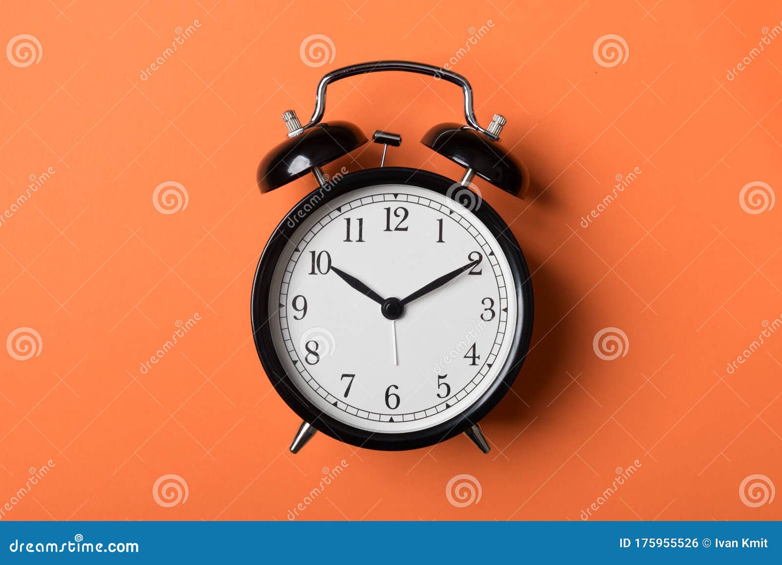 Black Vintage Alarm Clock on Orange Background Stock Photo - Image of ...