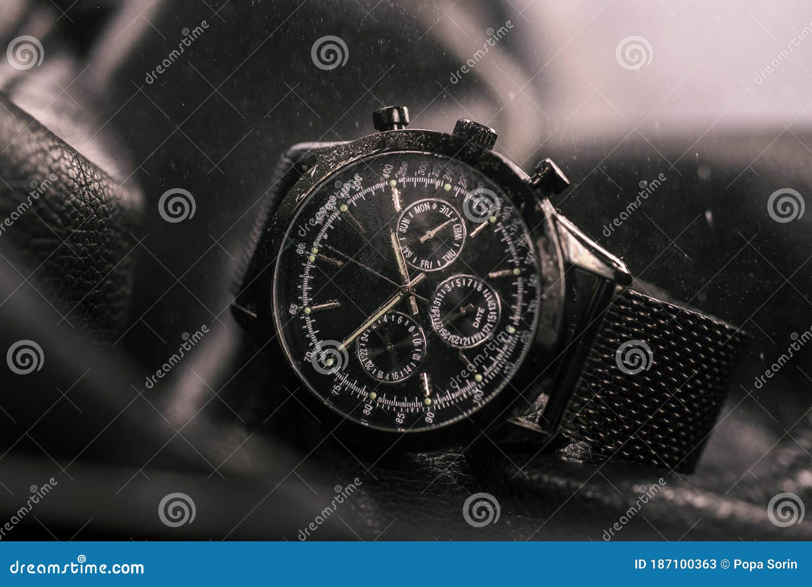 A Black Watch Over a Dark Background Stock Image - Image of business ...