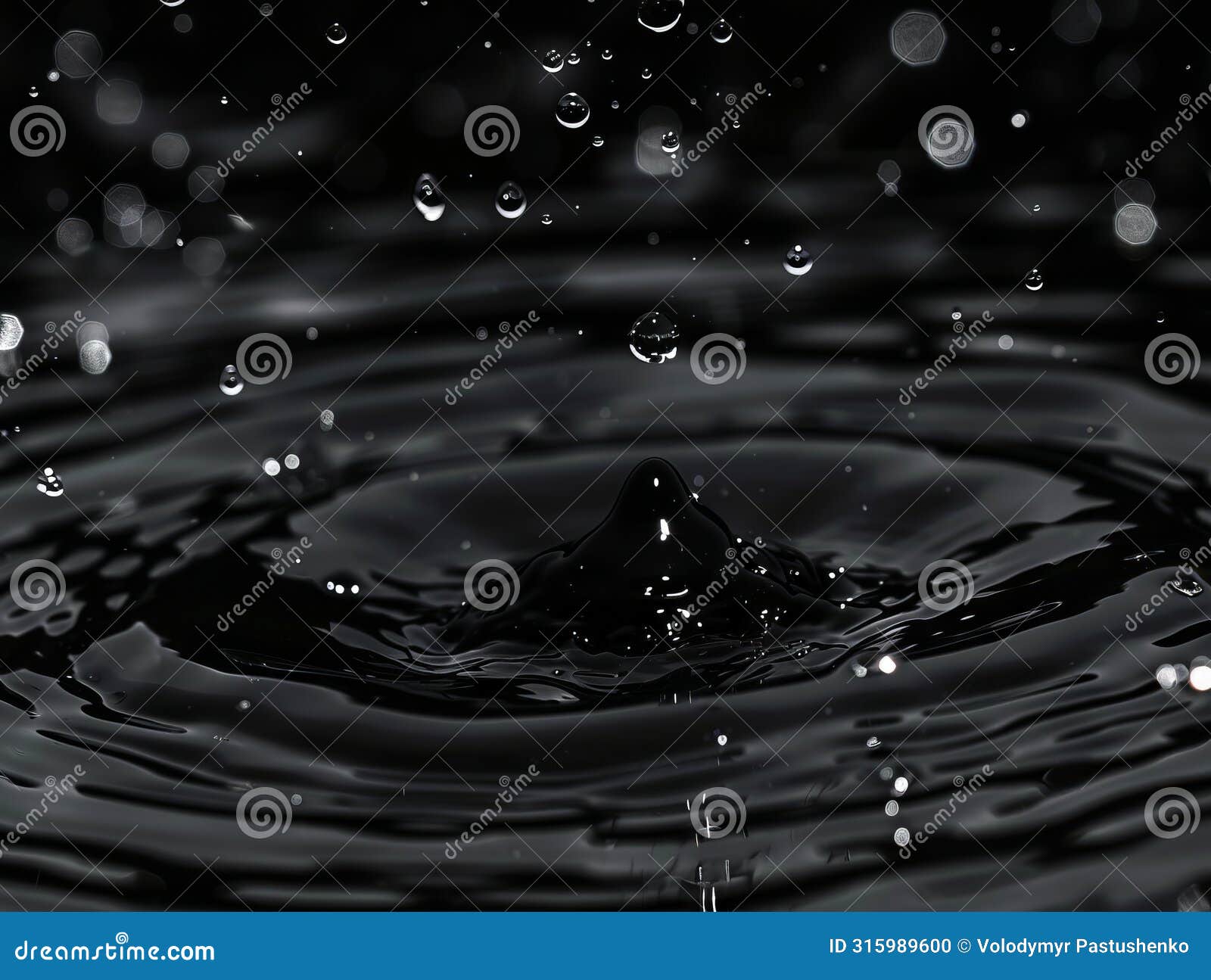 A Black Water Drop with Water Droplets Stock Photo - Image of liquid ...