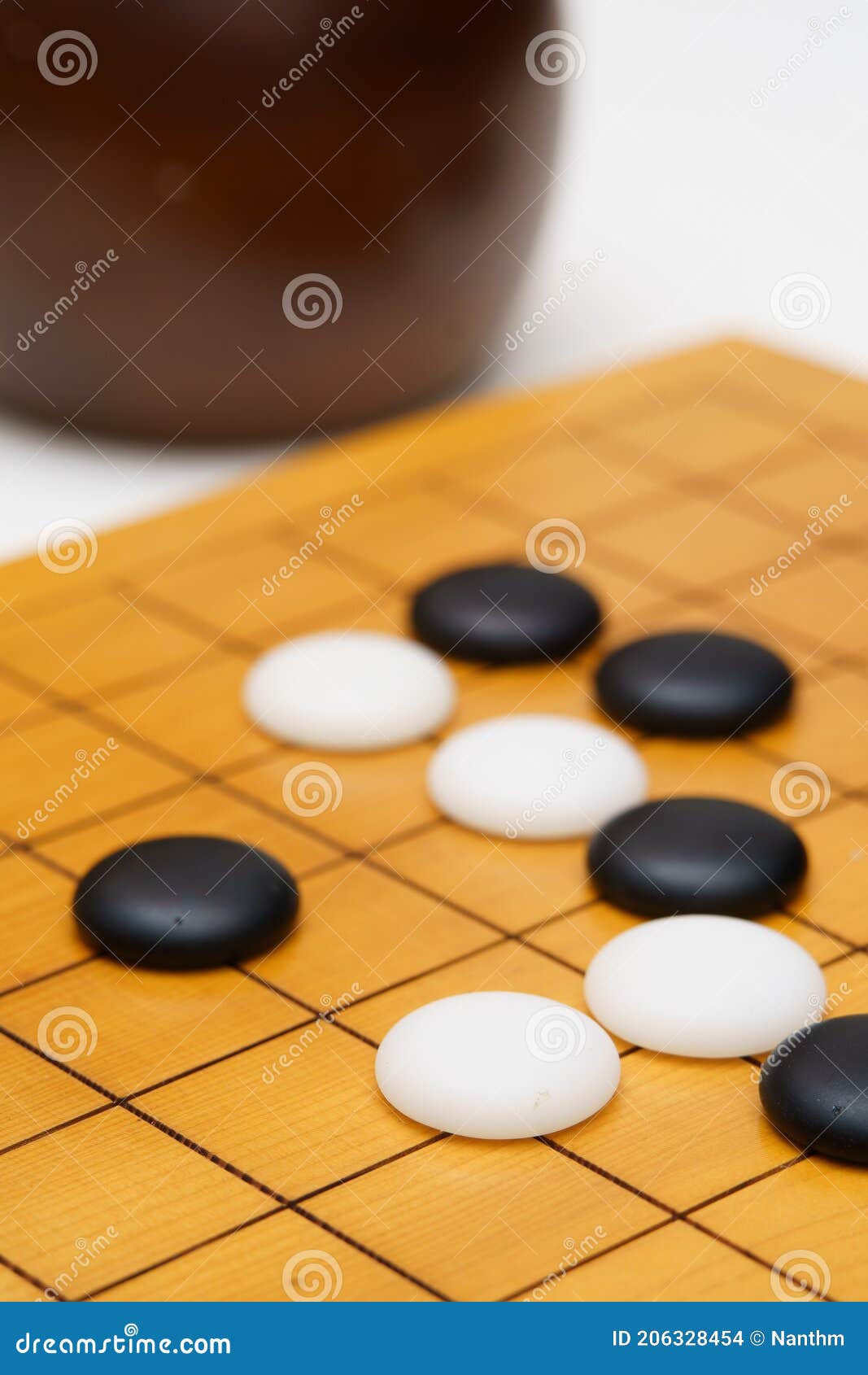 Black and White Baduk Stones on Wood Board Stock Photo - Image of goban ...
