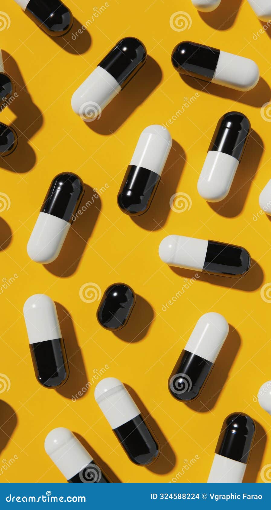 Black and White Capsules on Yellow Background, Top View. Pharmaceutical ...