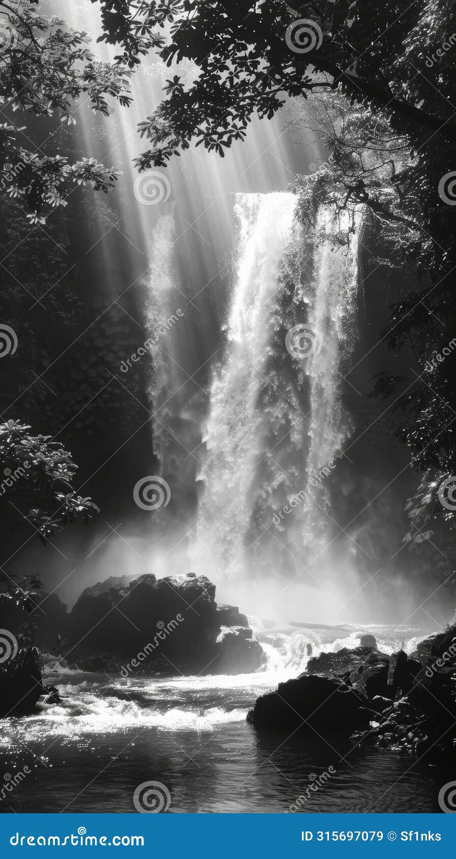 A Black and White Capture of a Powerful Waterfall, with Rays of Light ...