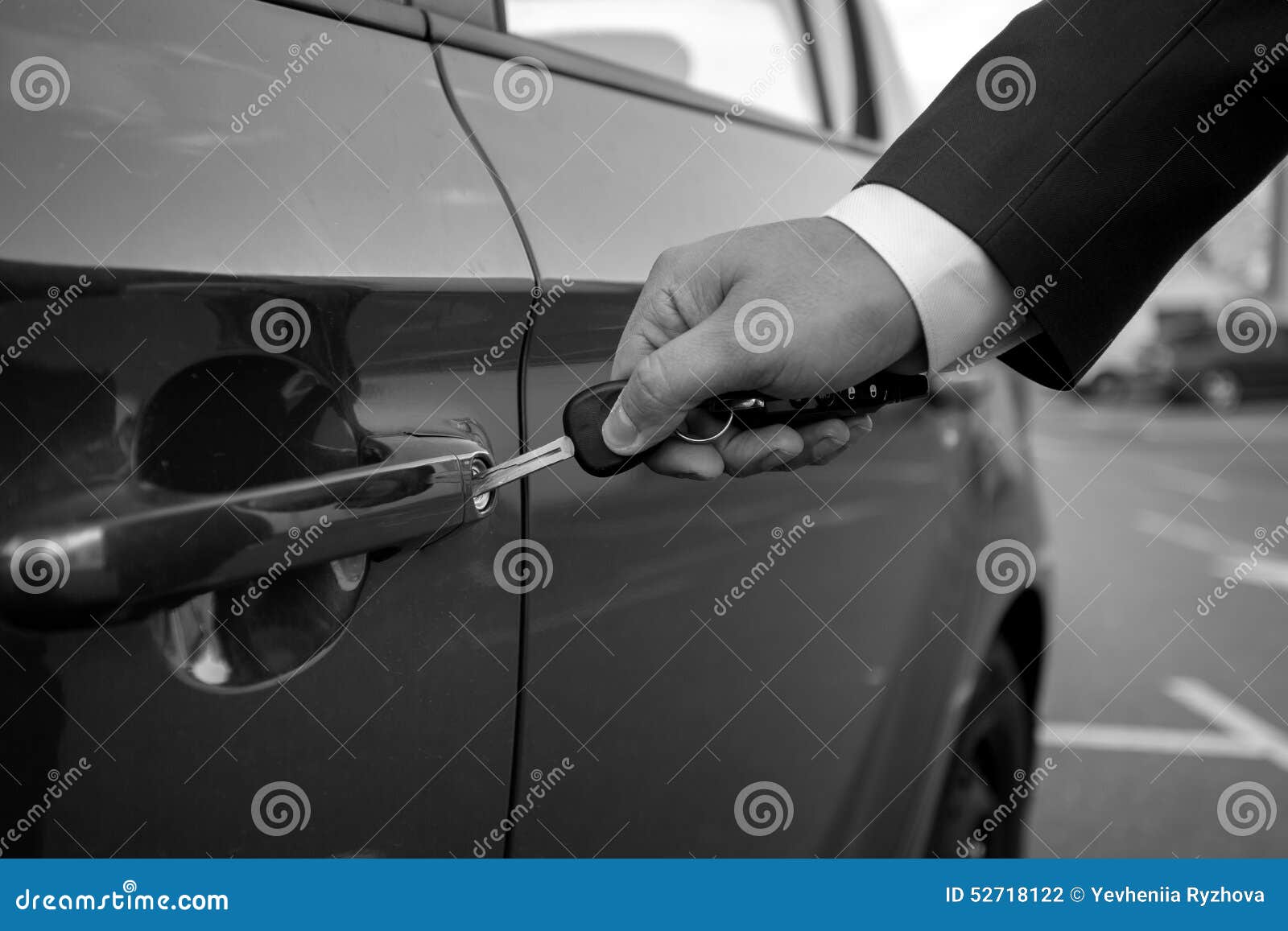 Black and White Closeup of Man Inserting Car Key in the Hole Stock ...