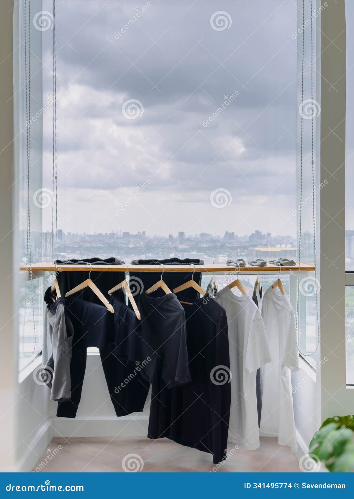 Black and White Clothes Hanging at the Balcony in the Cloudy Day. Stock ...